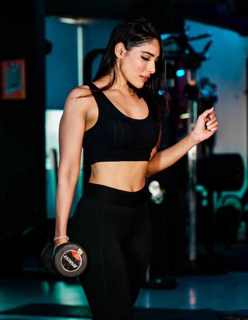 A gym girl with dumbbell - PixaHive