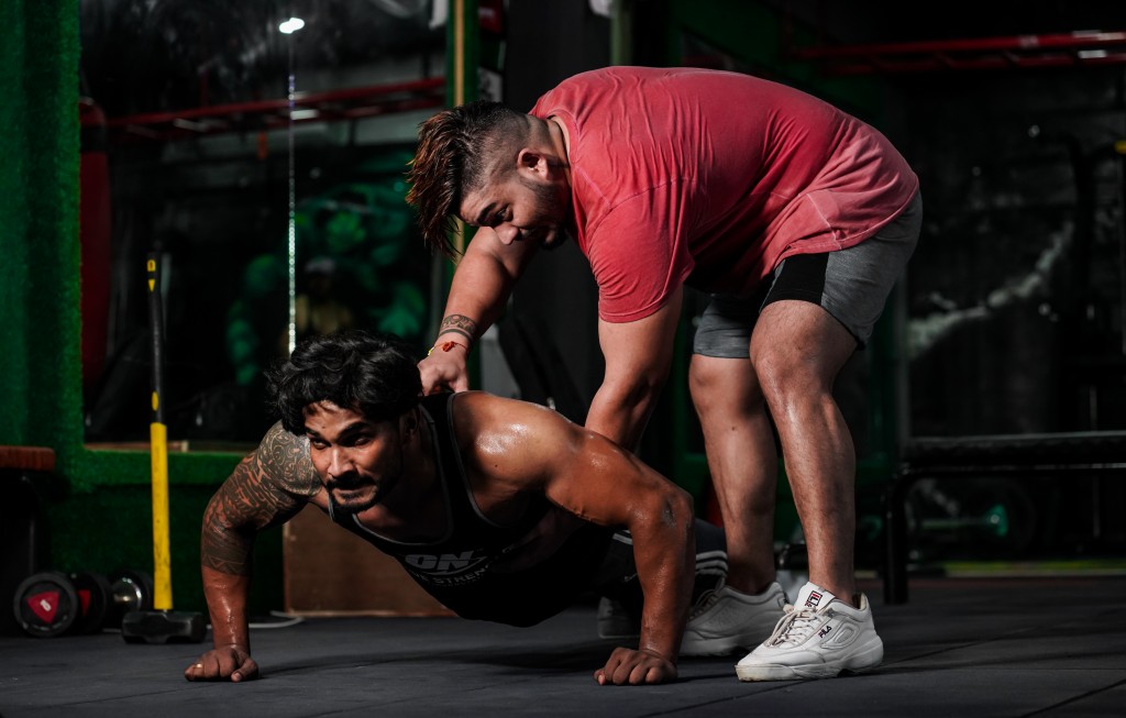 Bodybuilder Doing push-ups exercises - PixaHive