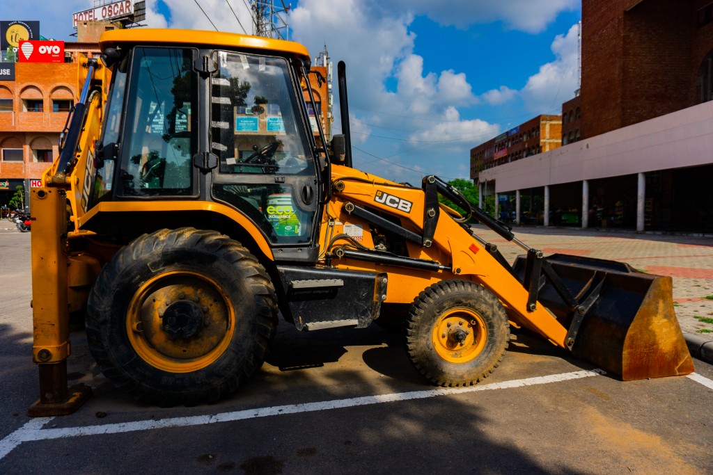 JCB with cloudy sky in background - PixaHive