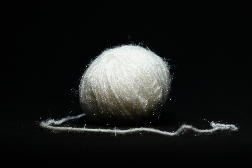 White Wool Ball on Black Background - PixaHive