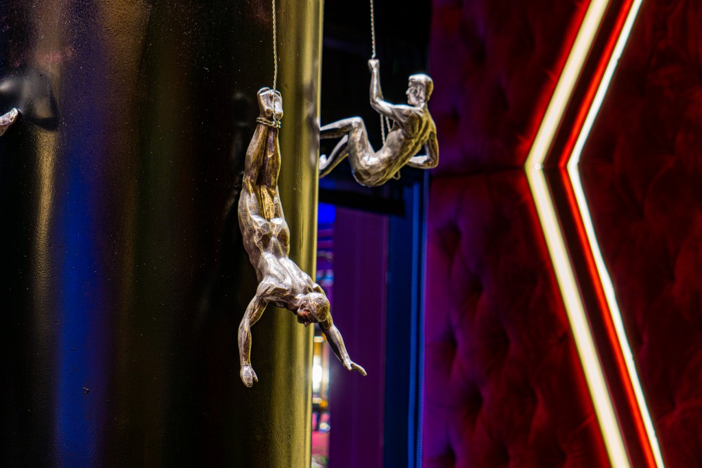 mini statues of people climbing - PixaHive