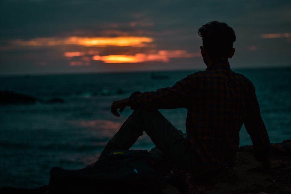 A boy at a sunset point - PixaHive
