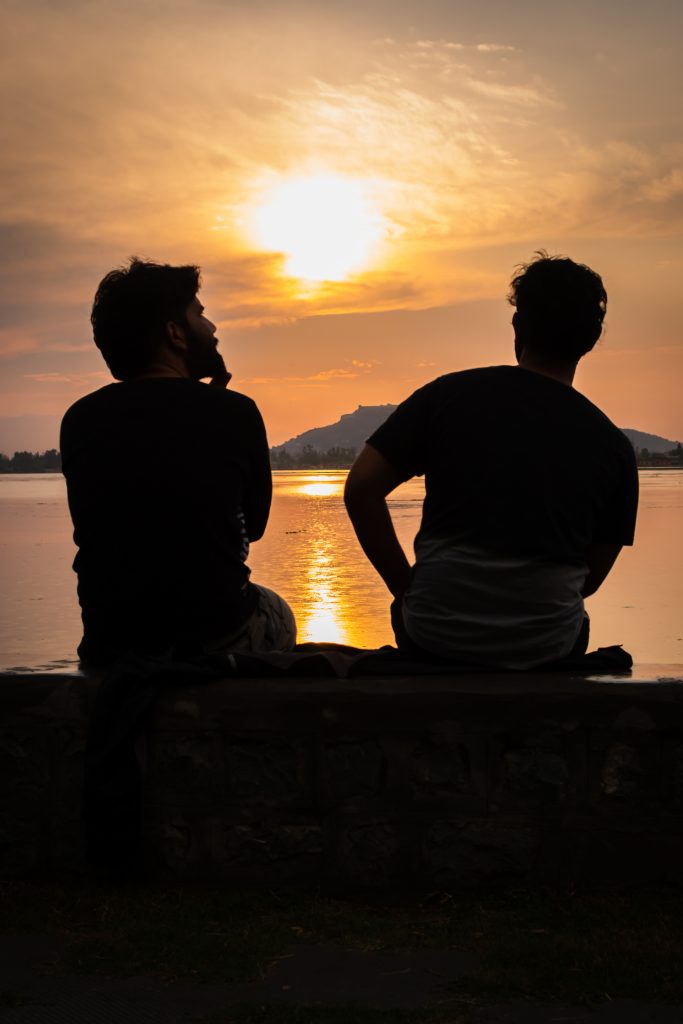 Friends relaxing on the shore of Dal Lake - PixaHive