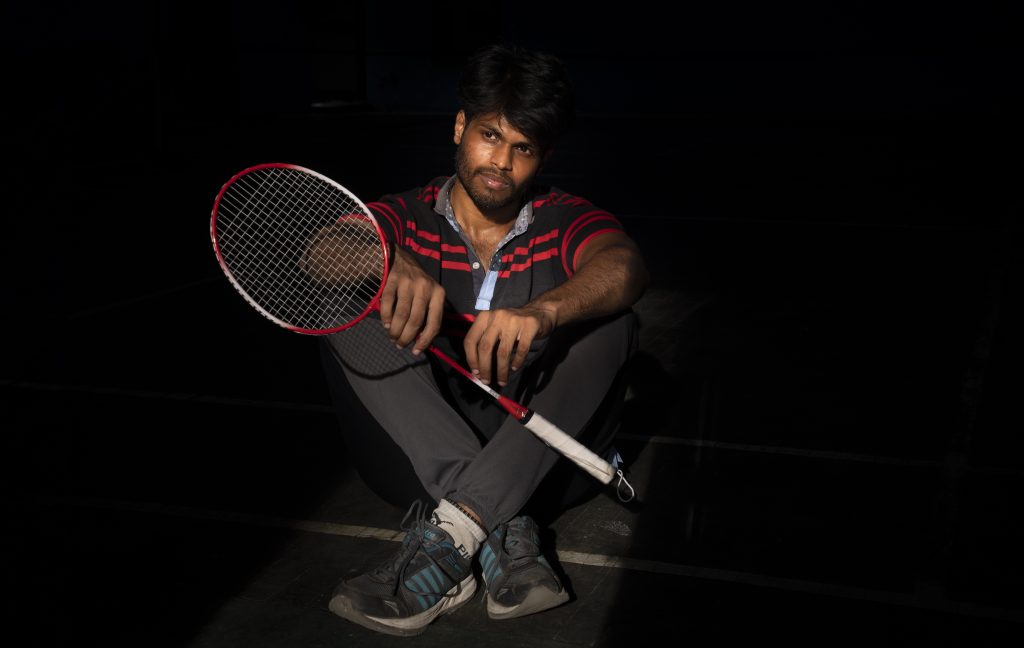 Indian male model holding badminton racket - PixaHive