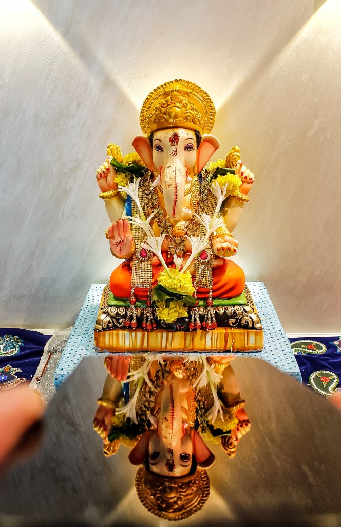Lord Ganesha reflection on mobile screen - PixaHive