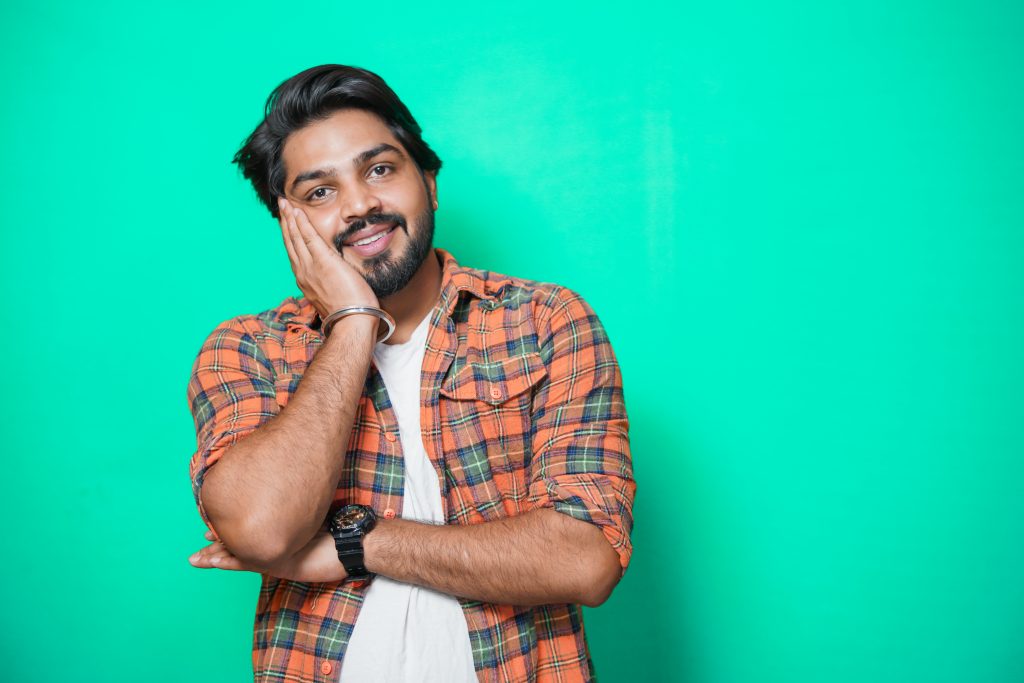 Man holding his face - PixaHive