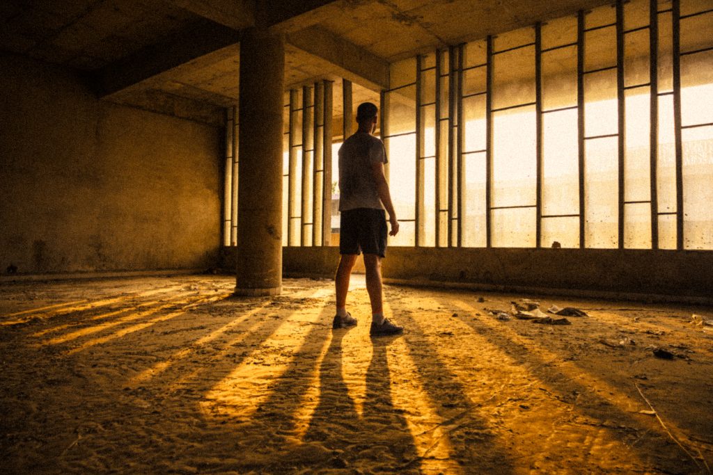 Man standing against sunlight - PixaHive