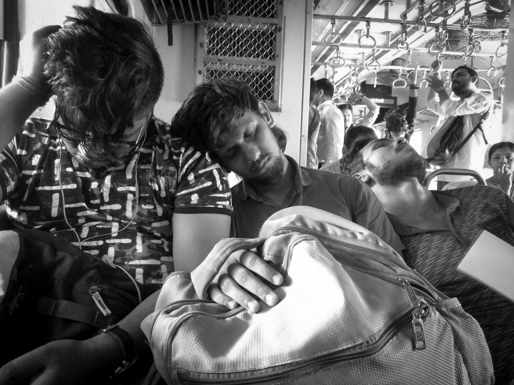 Men Sleeping on the Train - PixaHive