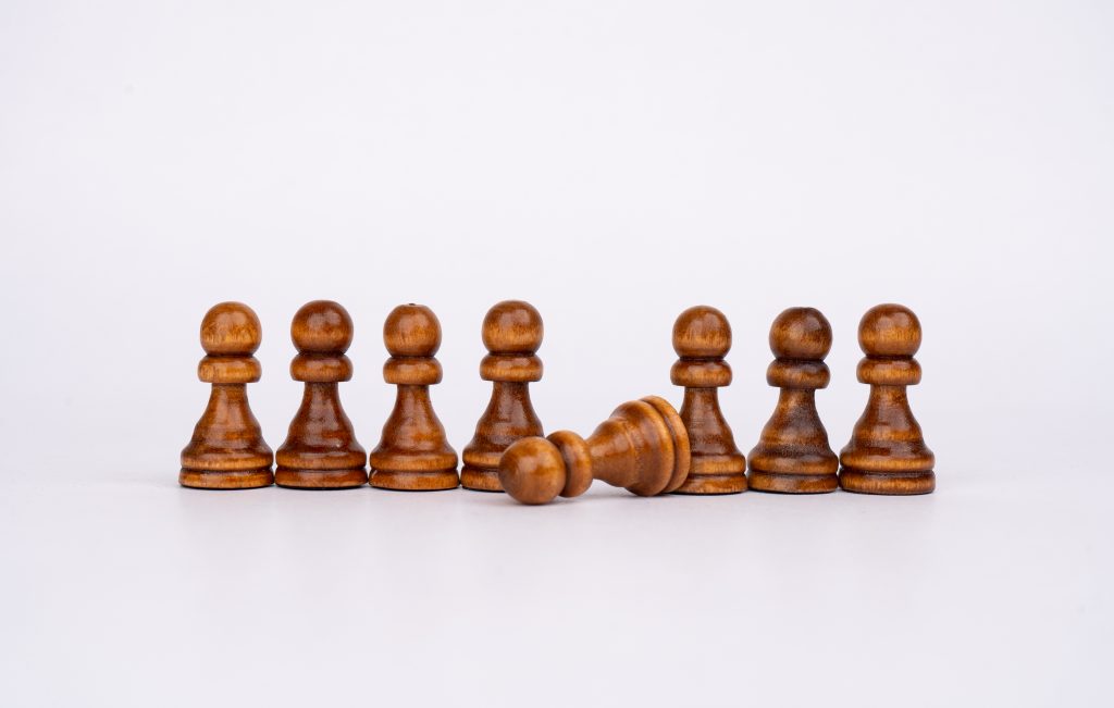 Pawns formation on white background - PixaHive