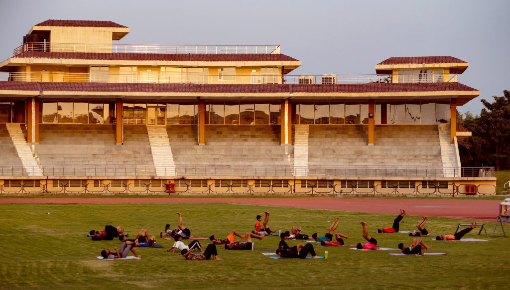 Players Doing Workout in a Stadium - PixaHive