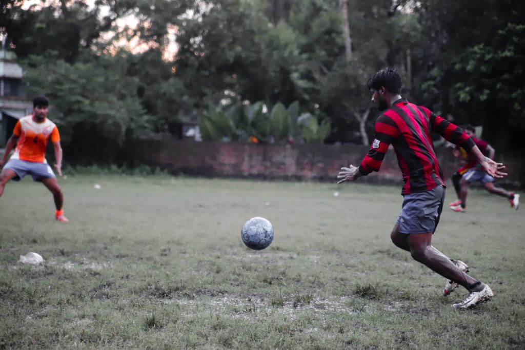 Players doing and intense football game - PixaHive