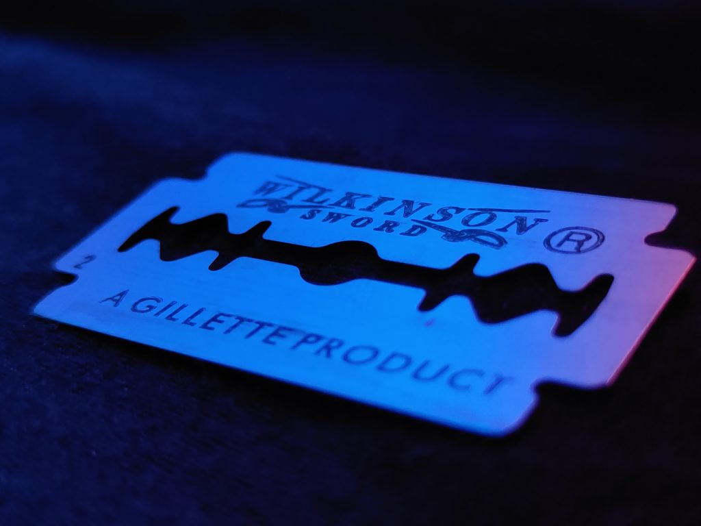 Razor blade on dark background - PixaHive