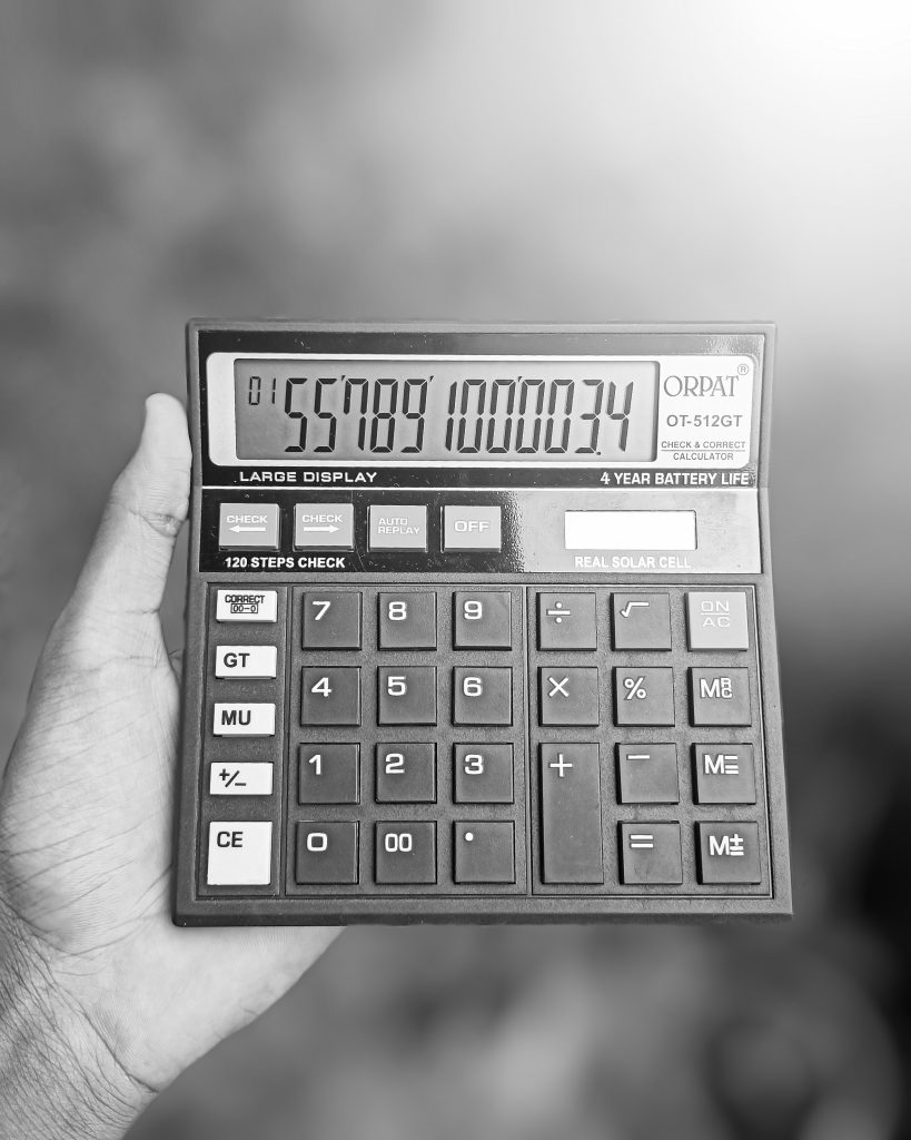 A calculator in hand - PixaHive