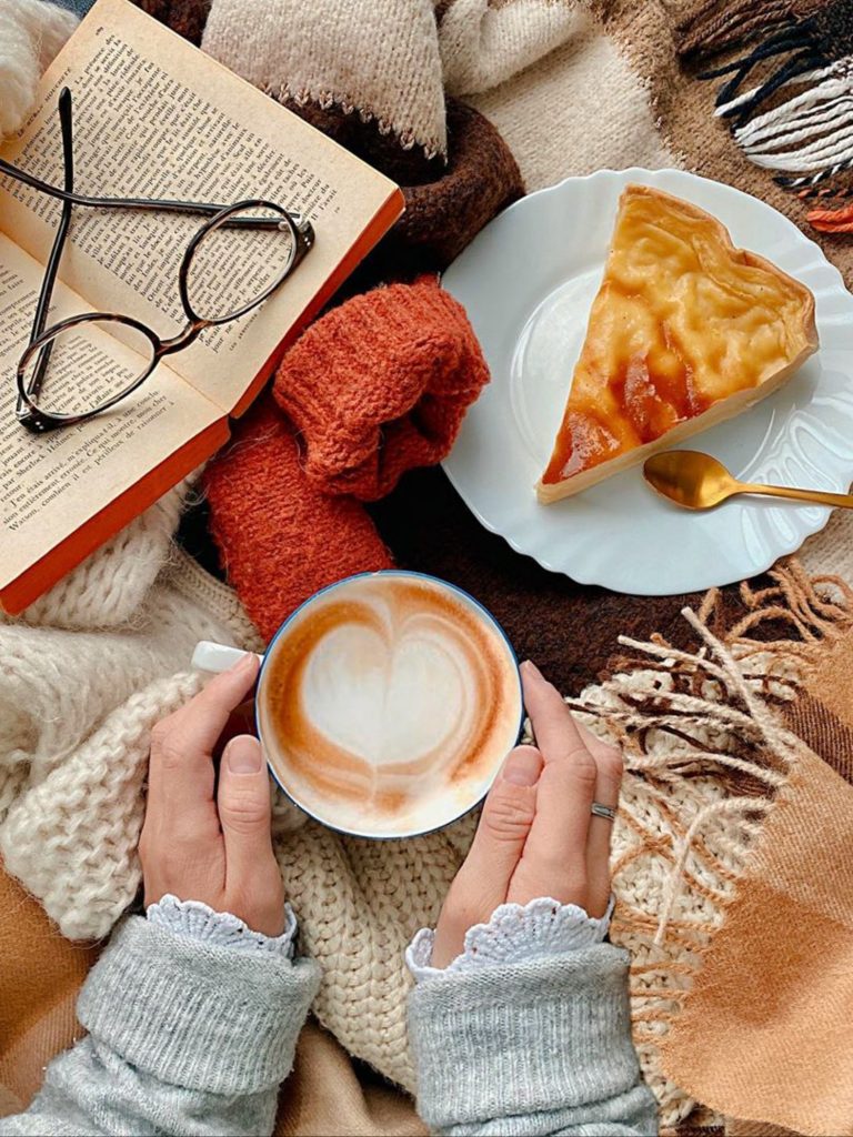 A coffee cup and patty while reading - PixaHive