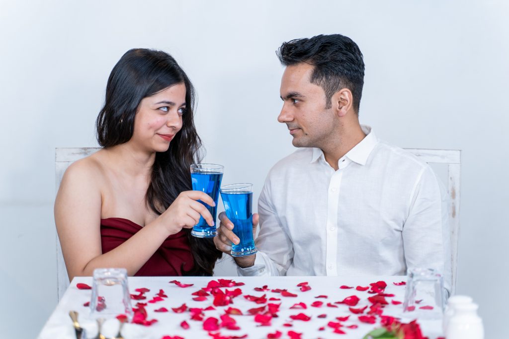 A couple having juice in a restaurant - PixaHive
