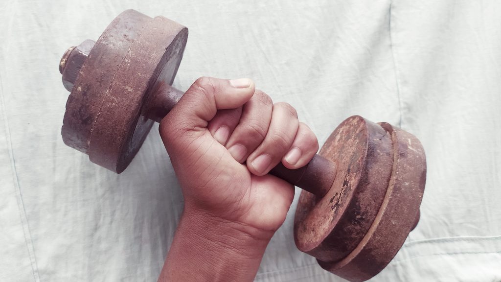 A dumbbell in hand - PixaHive