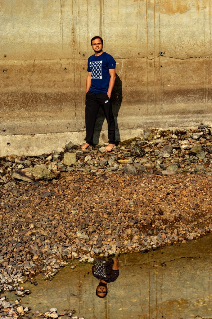 Reflection of a man in water - PixaHive