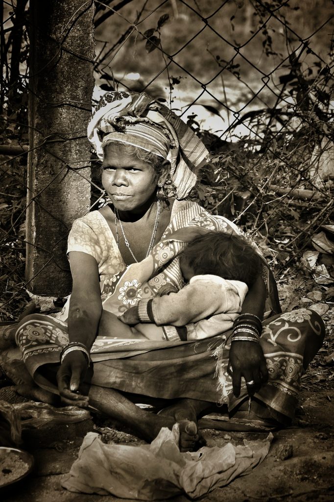 A poor mother with her child - PixaHive