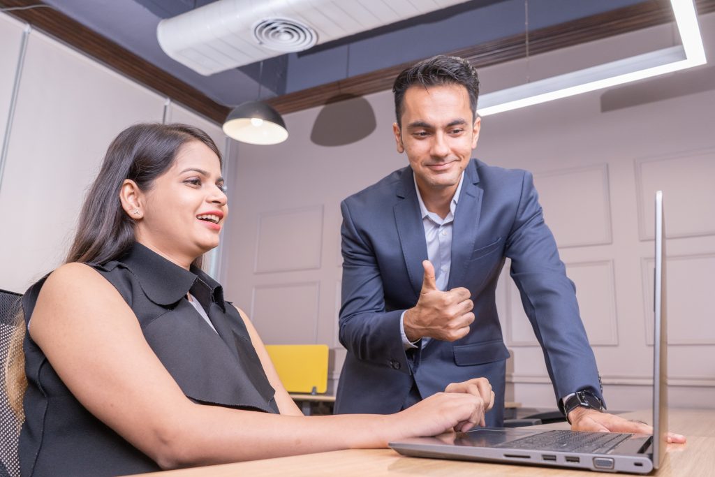 Boss congratulating employee - PixaHive