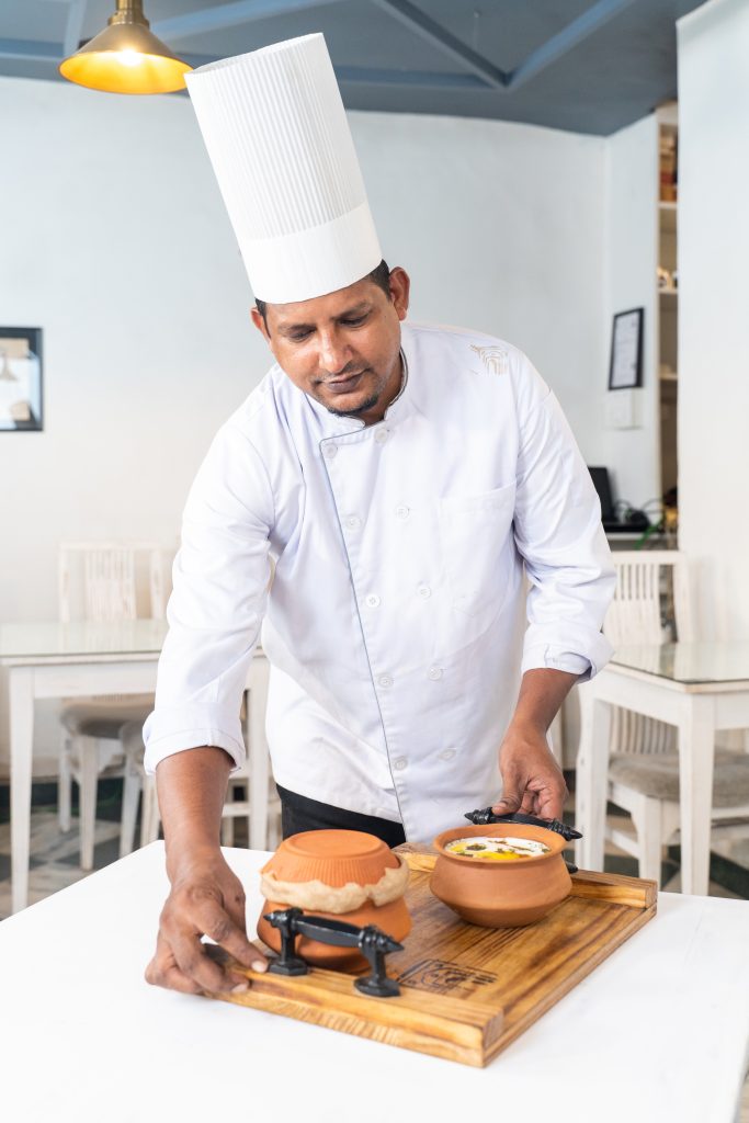 Chef serving food in restaurant - PixaHive