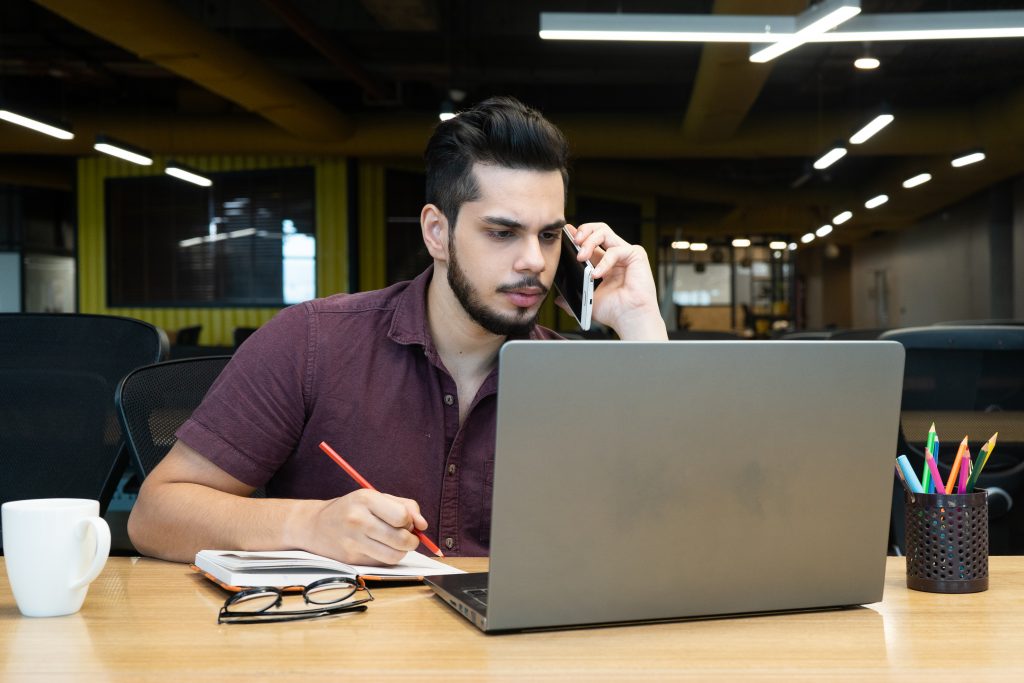 Employee noting down points - PixaHive