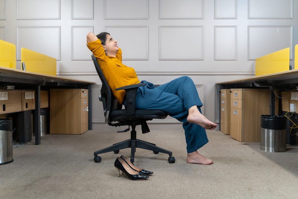 Employee relaxing in office - PixaHive