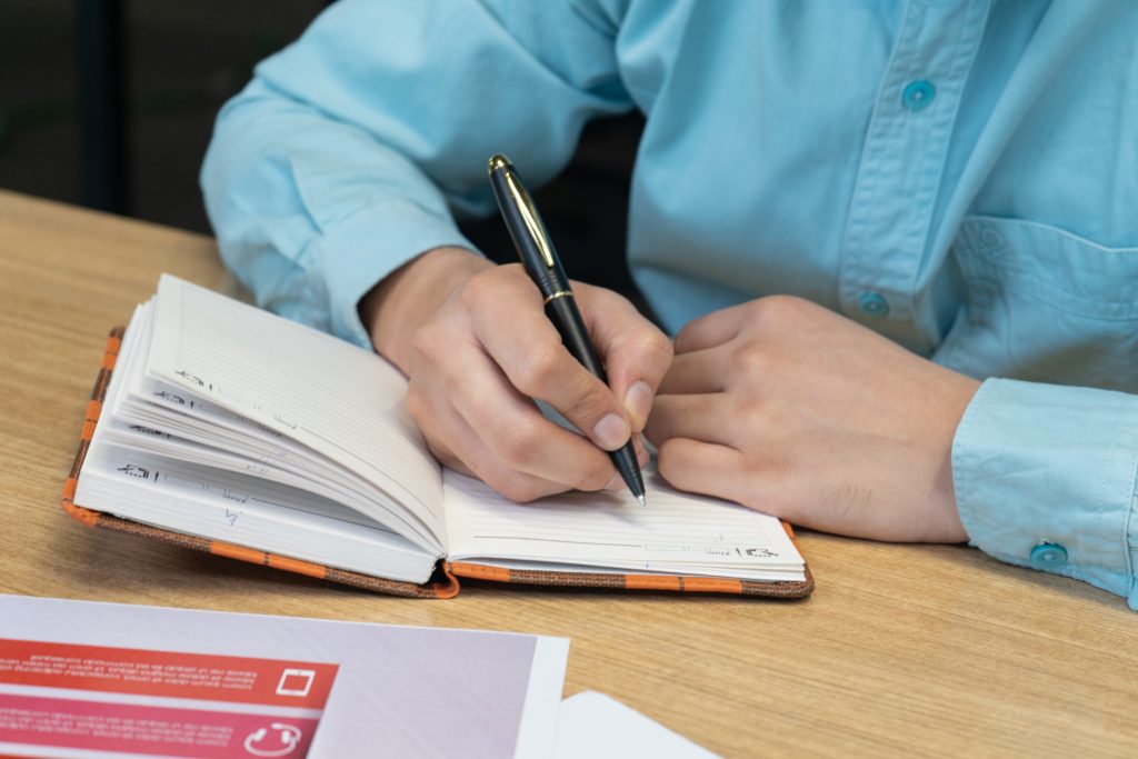 Employee taking down notes - PixaHive