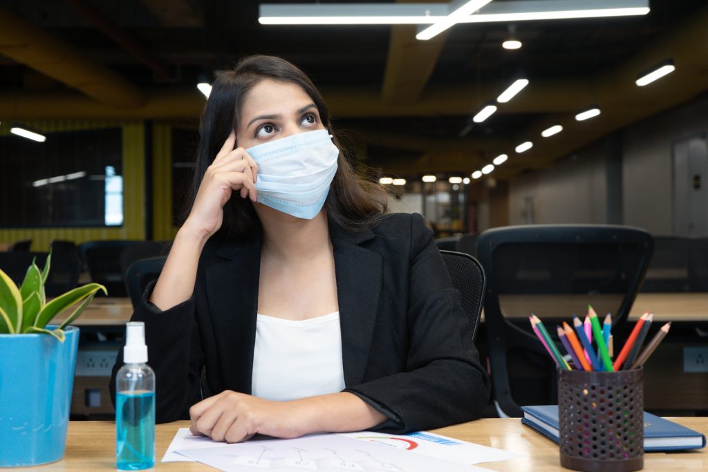 Girl thinking in the office - PixaHive