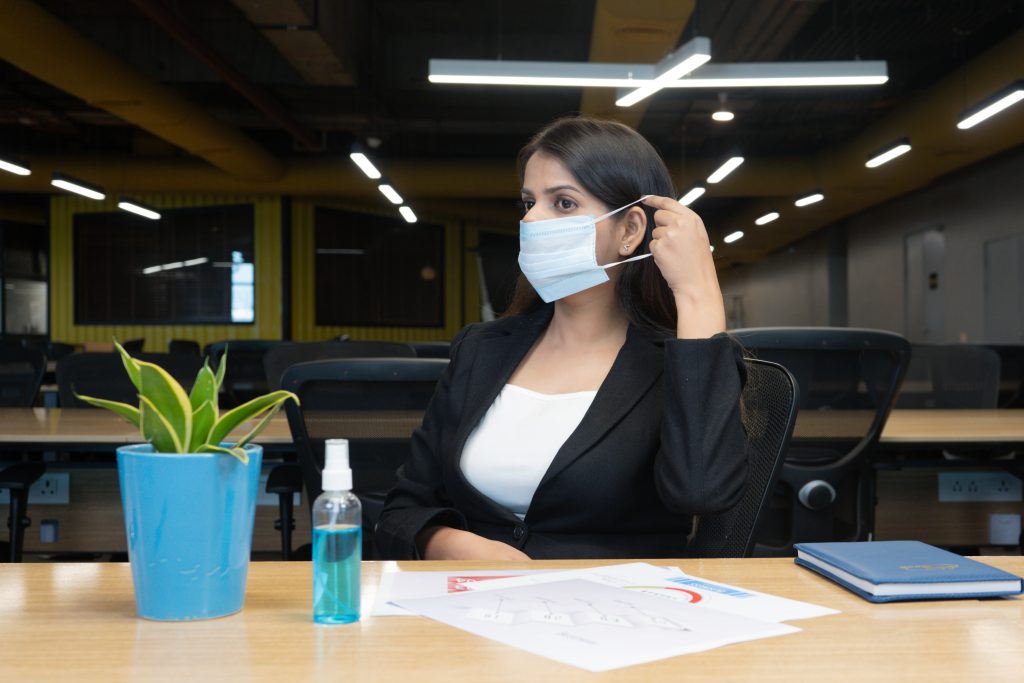 Girl wearing mask in office - PixaHive