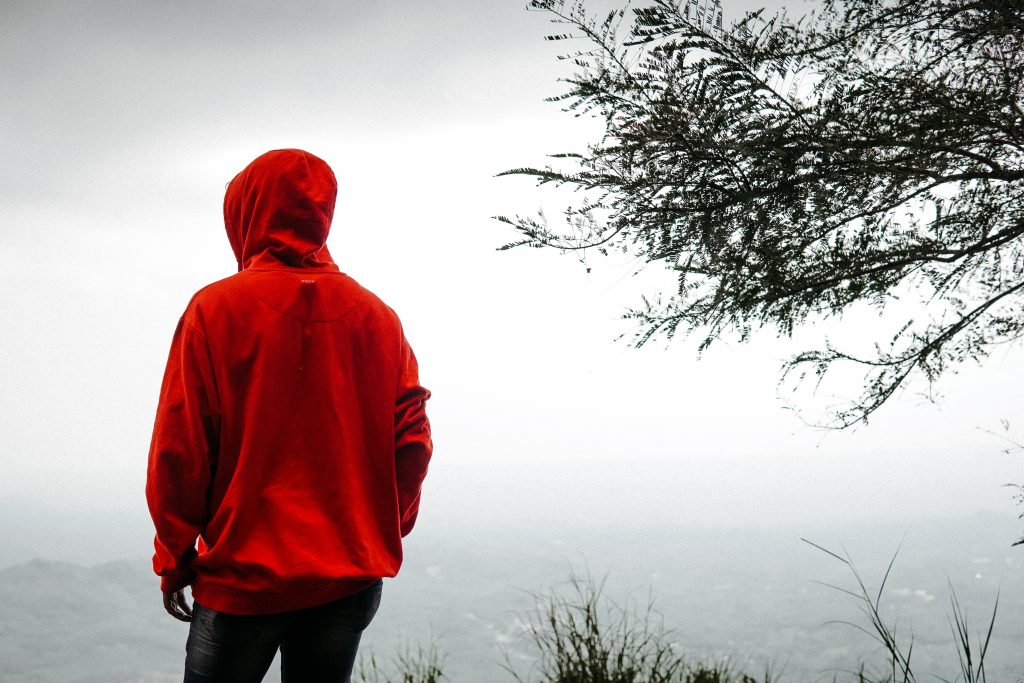 An alone boy at mountain top - PixaHive