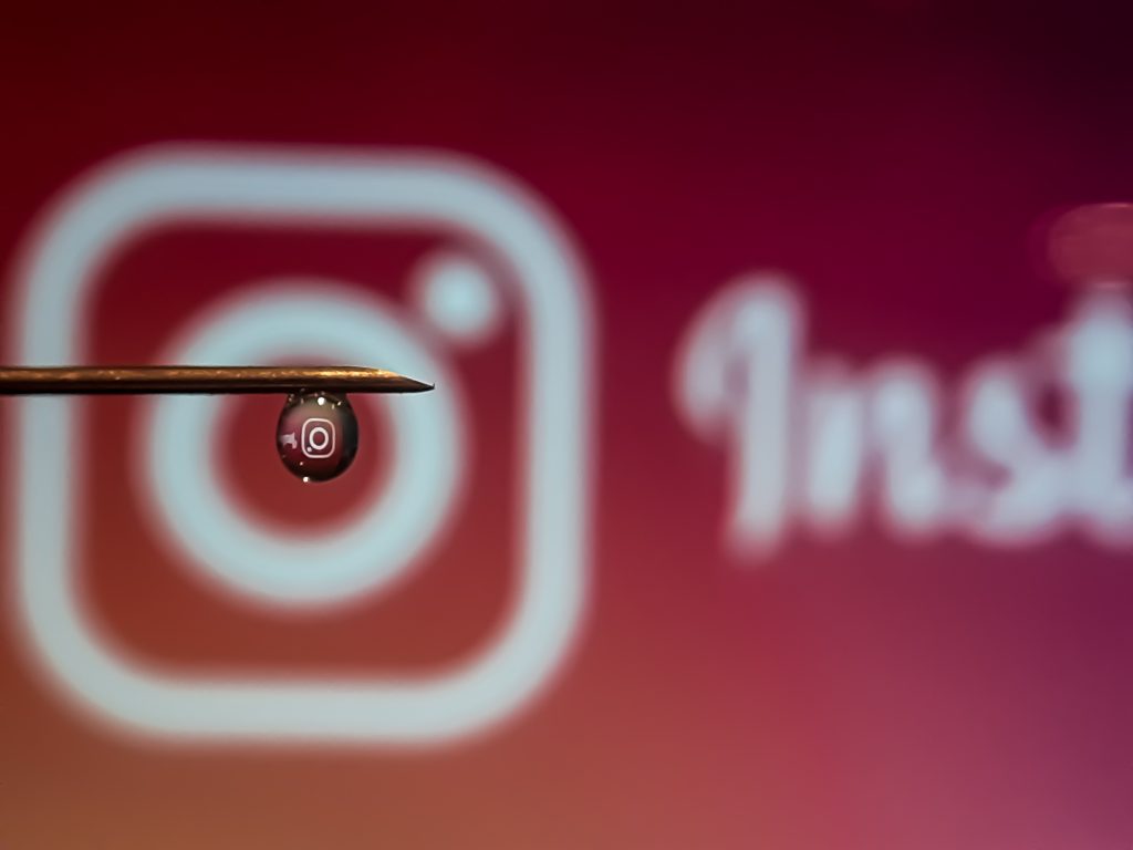 Instagram logo in water droplet - PixaHive