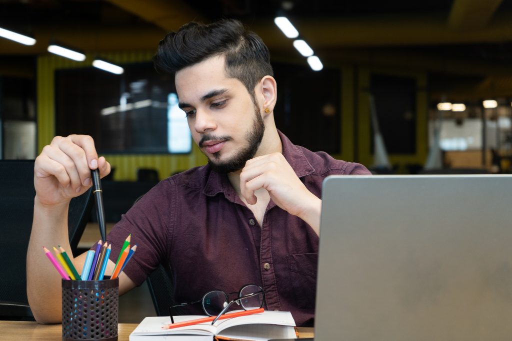 Man taking out pen - PixaHive