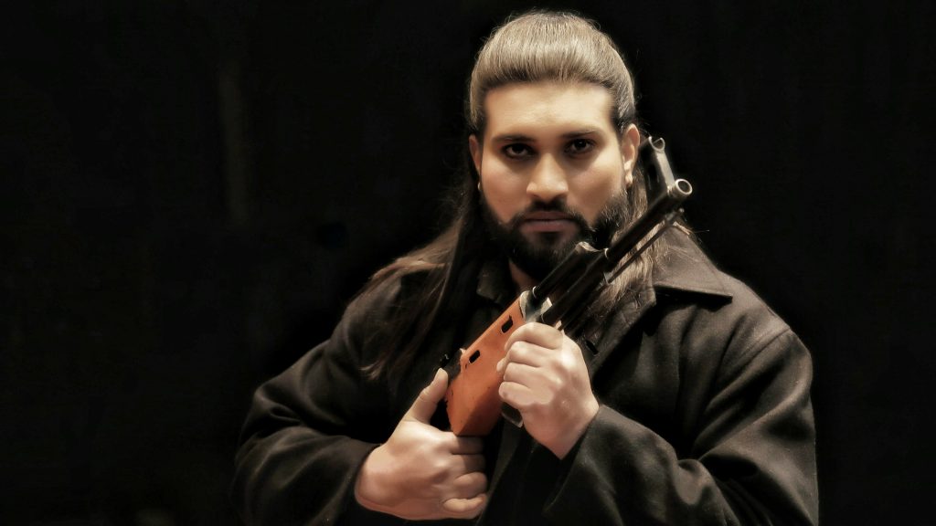 Man with gun landscape - PixaHive