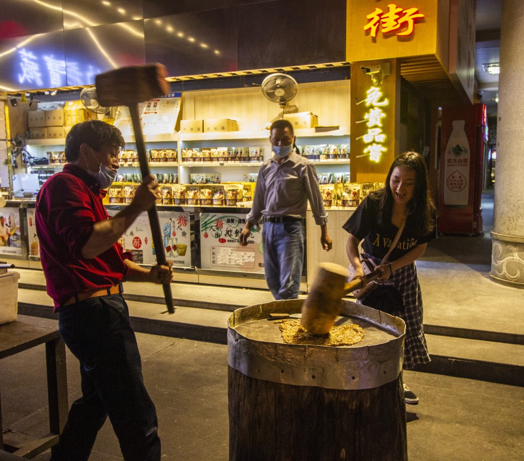 People playing a hammer game - PixaHive