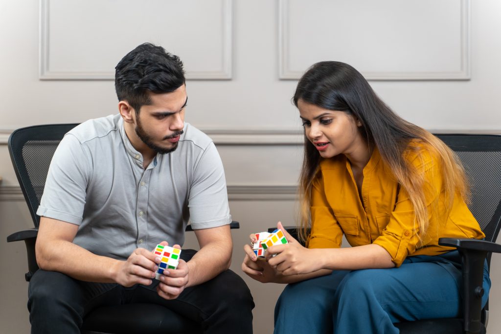 Working people solving Rubik’s cube - PixaHive