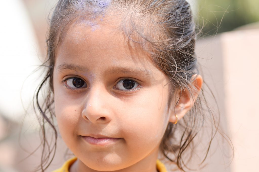 portrait of a little girl with little color on face - PixaHive