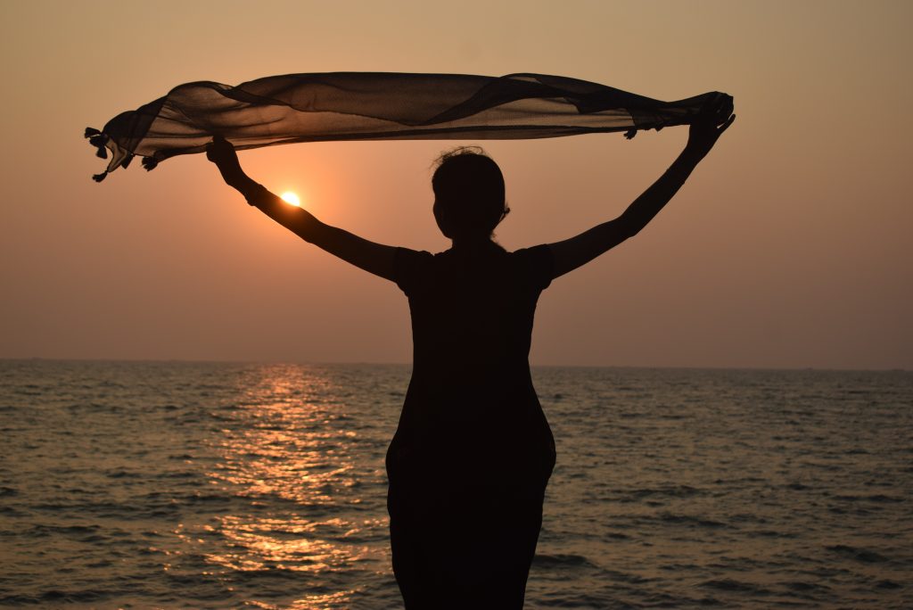 women on beach - PixaHive