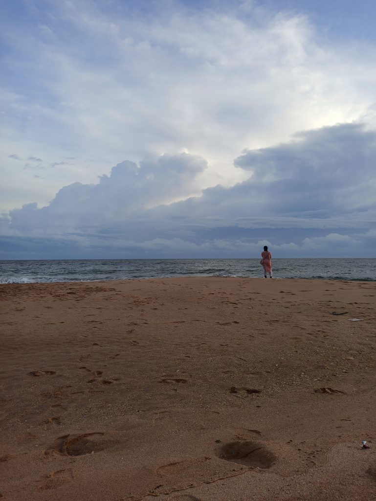 A girl alone in beach - PixaHive
