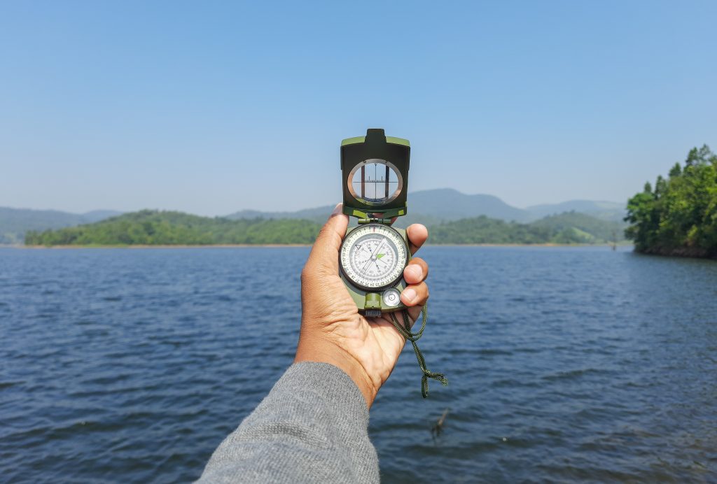 A magnetic compass in hand - PixaHive