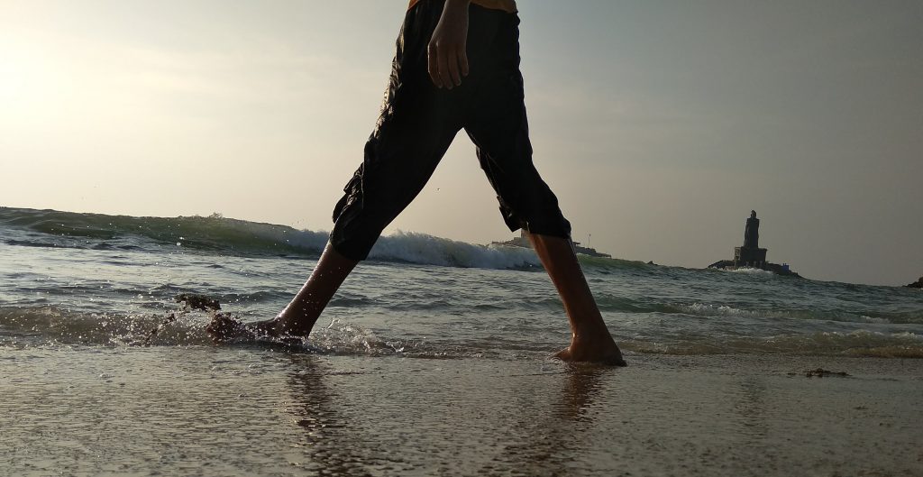 A person walking on a beach - PixaHive