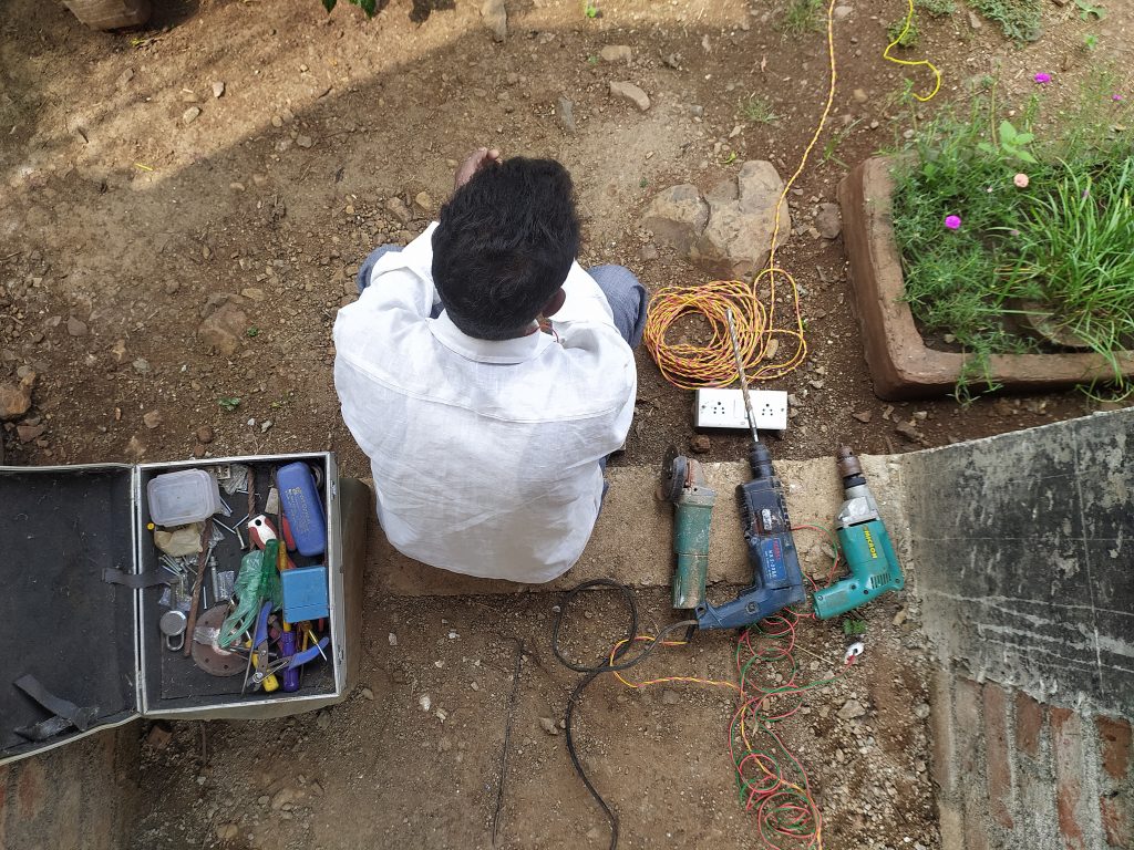 An electrician with tool box - PixaHive