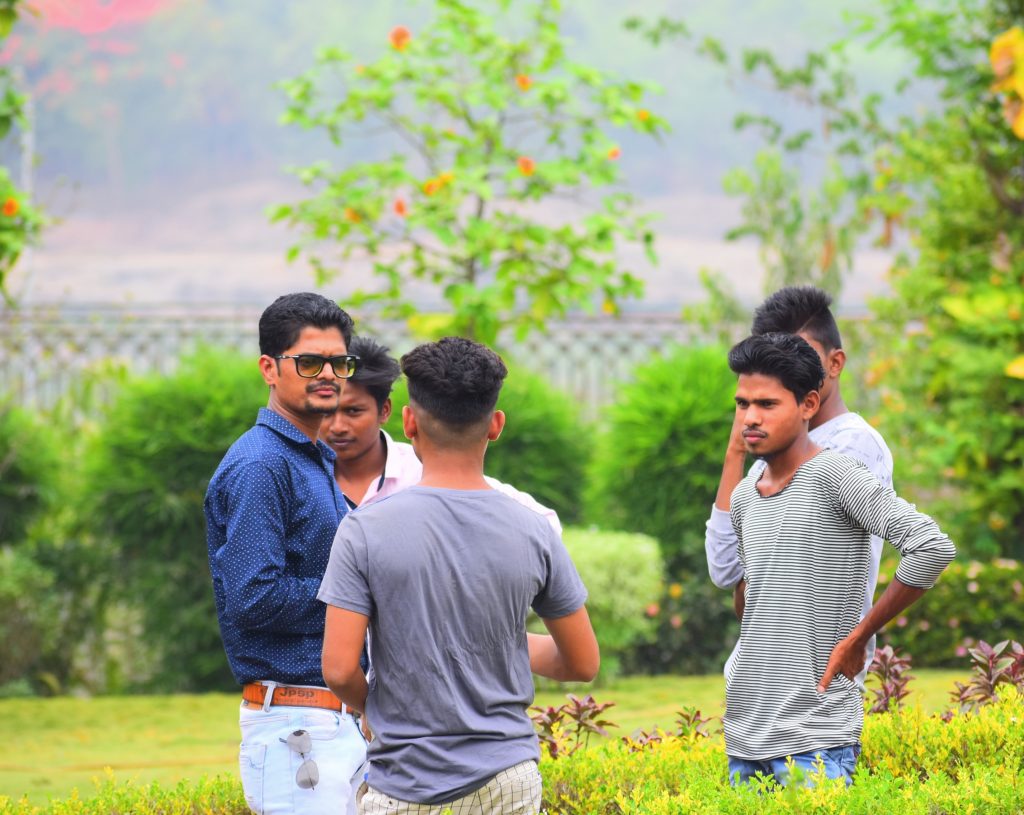 Boys talking with a man - PixaHive