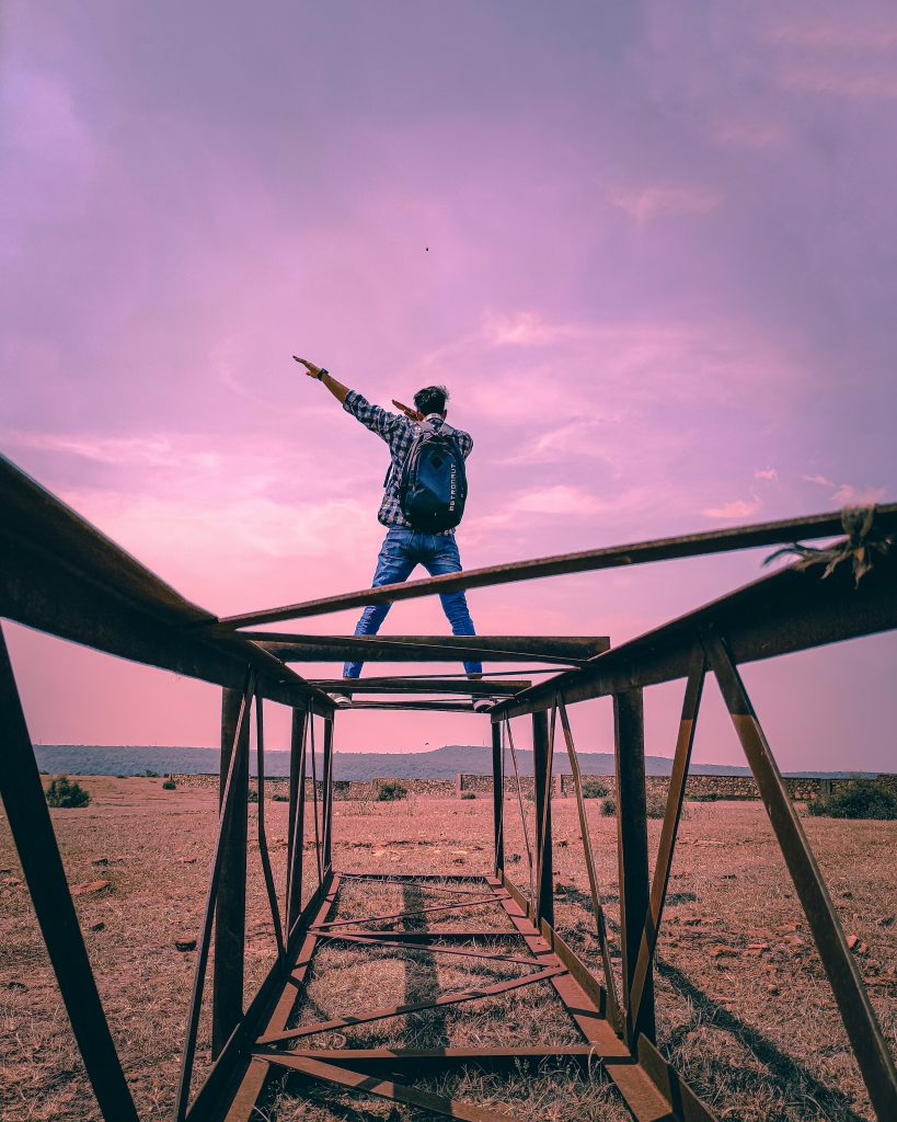 A boy on fallen tower - PixaHive