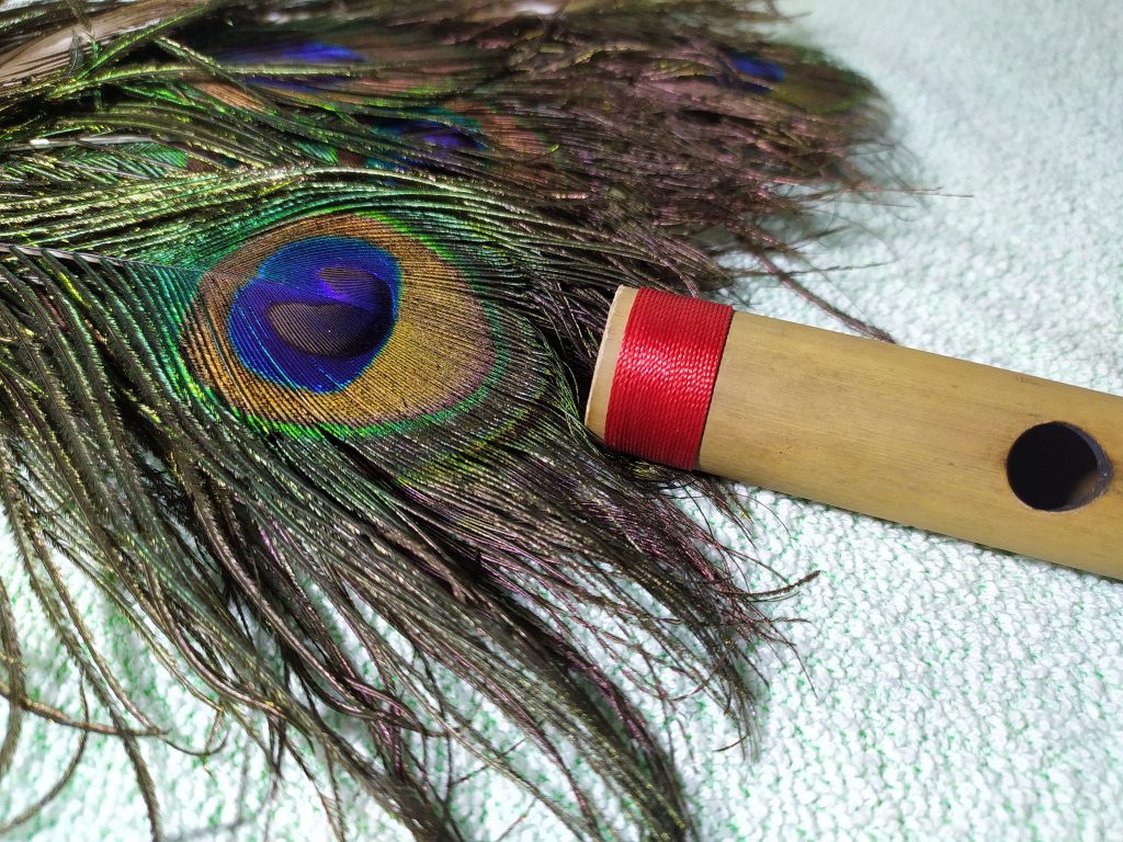 Flute with colourful feather - PixaHive