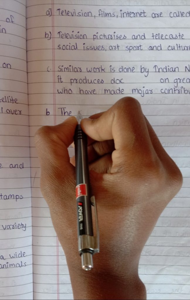 A student making notes - PixaHive