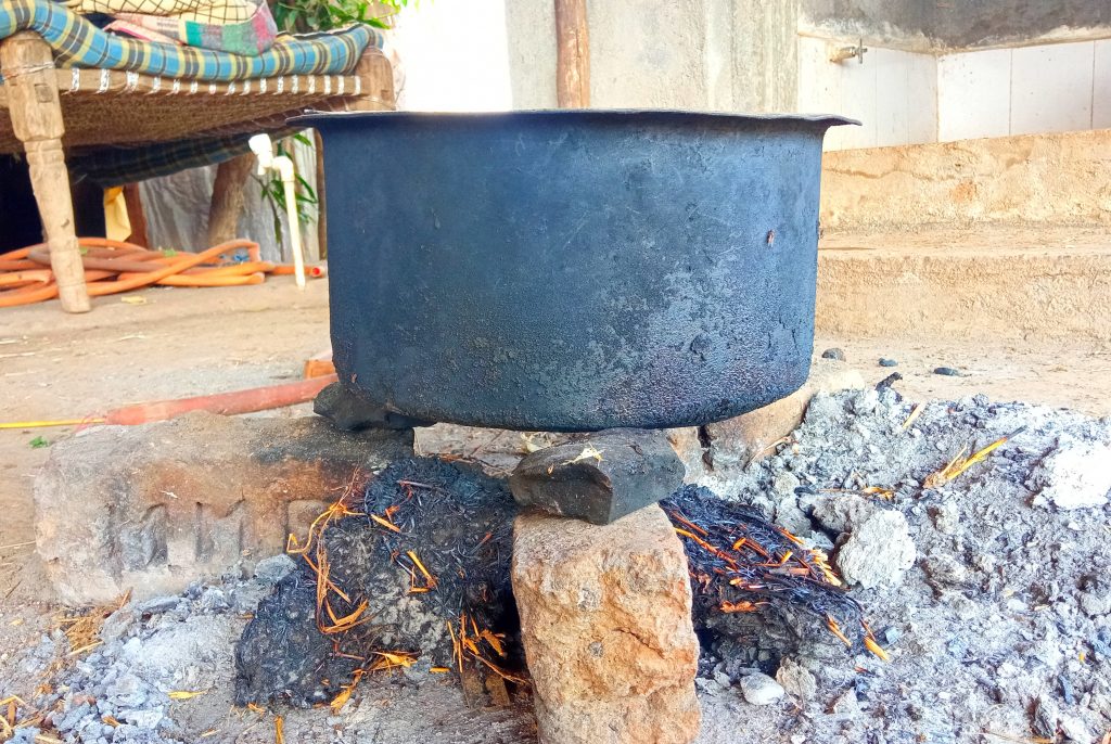 A water pot on bricks stove - PixaHive