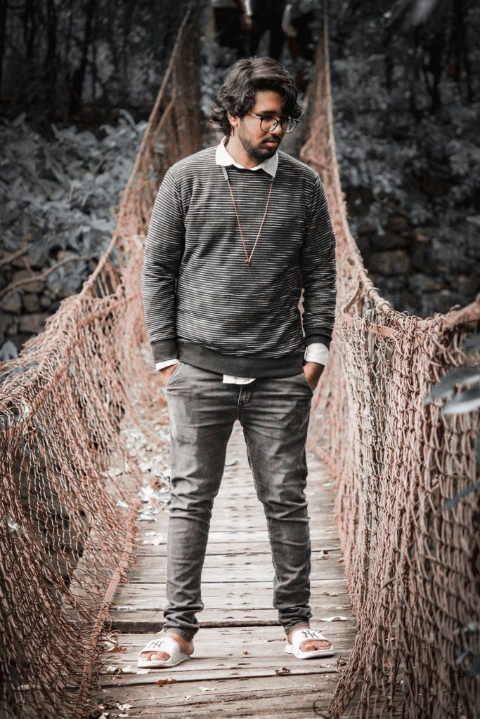 A boy on a pedestrian bridge - PixaHive