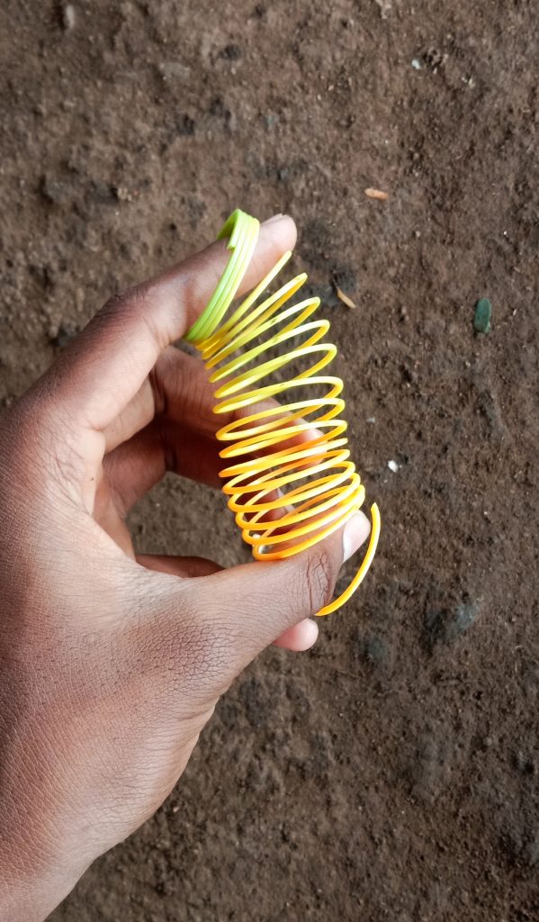 A helical spring in hand - PixaHive