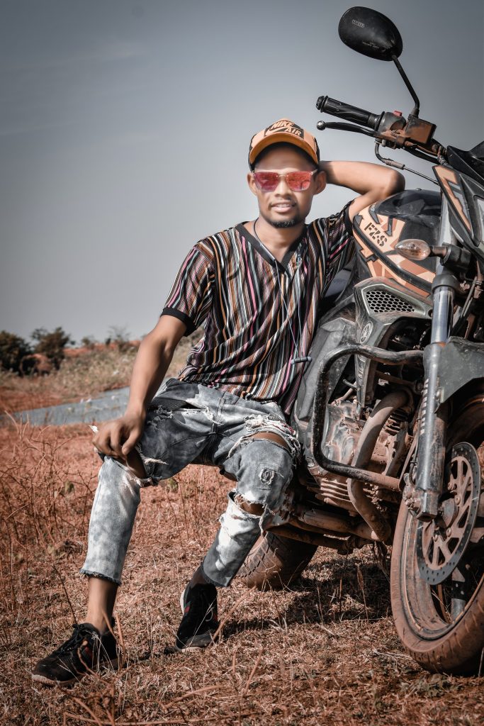 A boy posing with his bike - PixaHive
