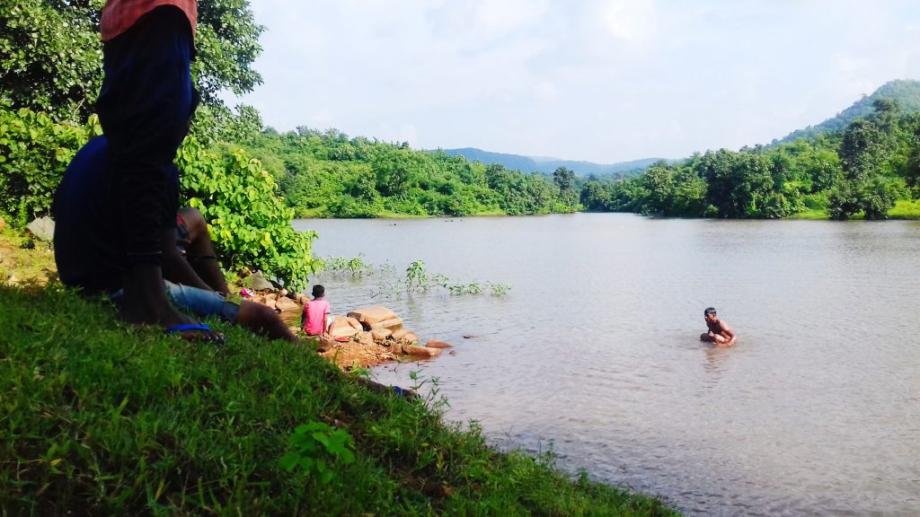 People at a lake - PixaHive